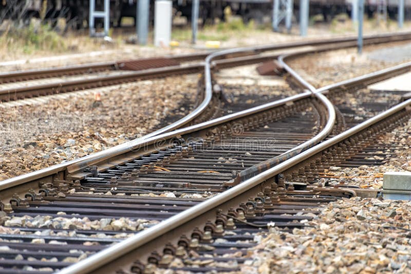 Rails in a railway station stock photo. Image of railroad - 176715346