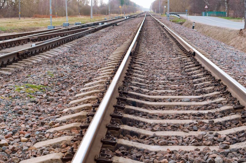 Rails in Three Rows, Railway Stretching into the Distance Stock Image ...