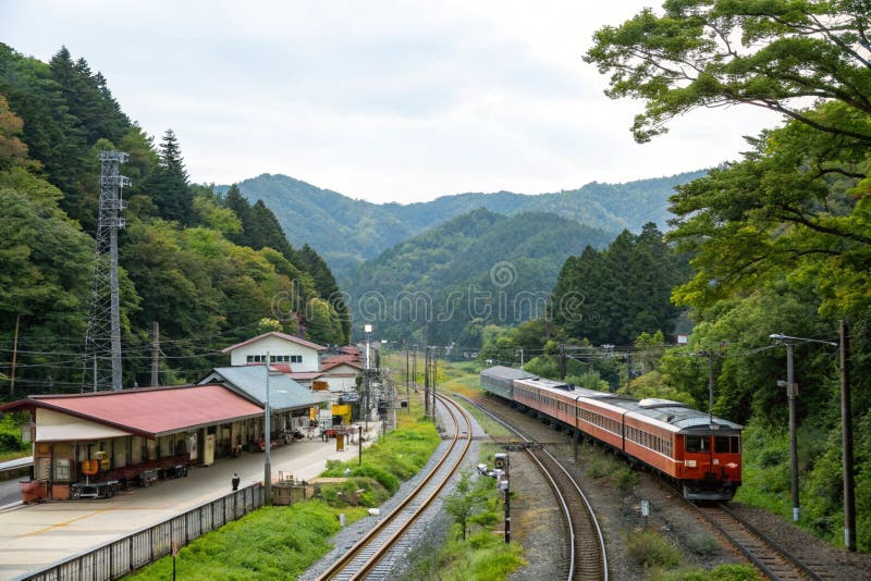 Rails and Trains at a Scenic Railway Station Stock Illustration ...