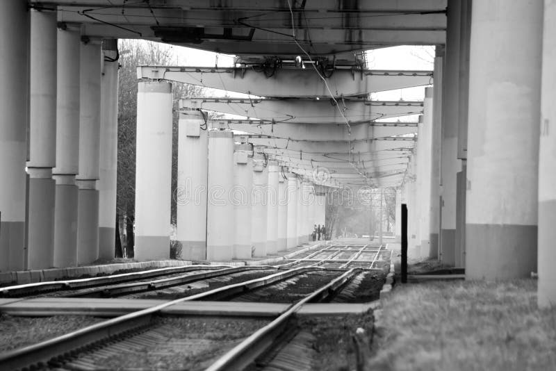 Rails Under the Bridge Black and White Stock Image - Image of traffic ...