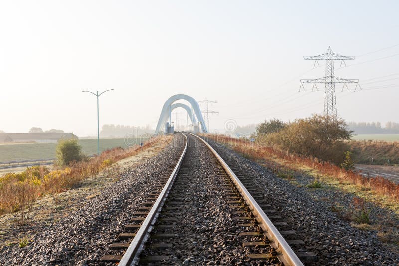 Railway along the field stock image. Image of outdoors - 79258865