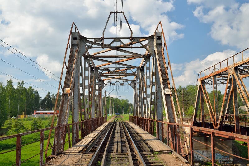 Railway Bridge Across the River and the Rails with the Arrow in Stock ...