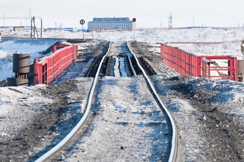 Railway Bridge And Deformation Of The Track, Built On Permafrost. Stock ... Railway Bridge And Deformation Of The Track, Built On Permafrost. Stock ...
