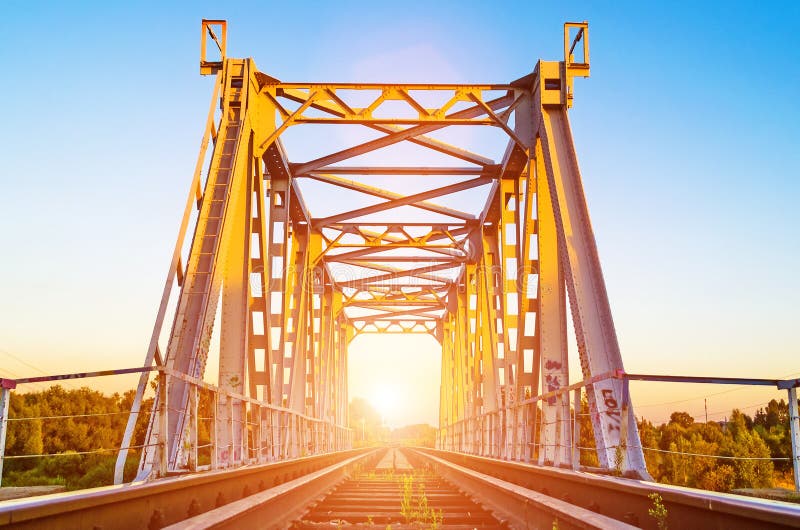 Railway Bridge in Summer Sunset and Grass Sleepers Stock Image - Image ...
