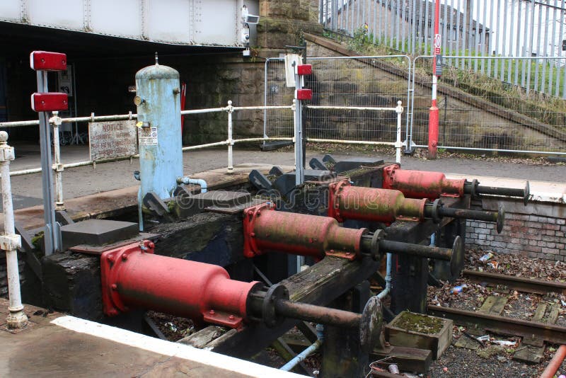 Red Railway Buffers in Paddington Railway Station, London, UK Editorial ...