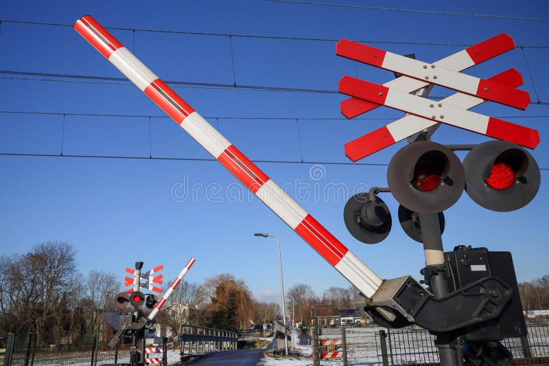 Railway Crossing with Red Lights and Barrier in the Zuidplaspolder ...