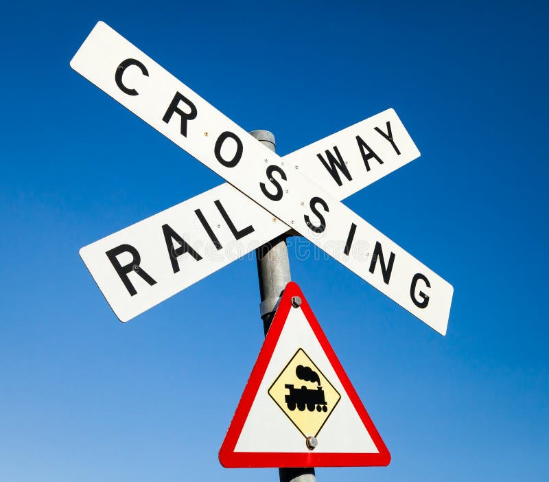 Railway Crossing Sign Against a Blue Sky Stock Photo - Image of danger ...