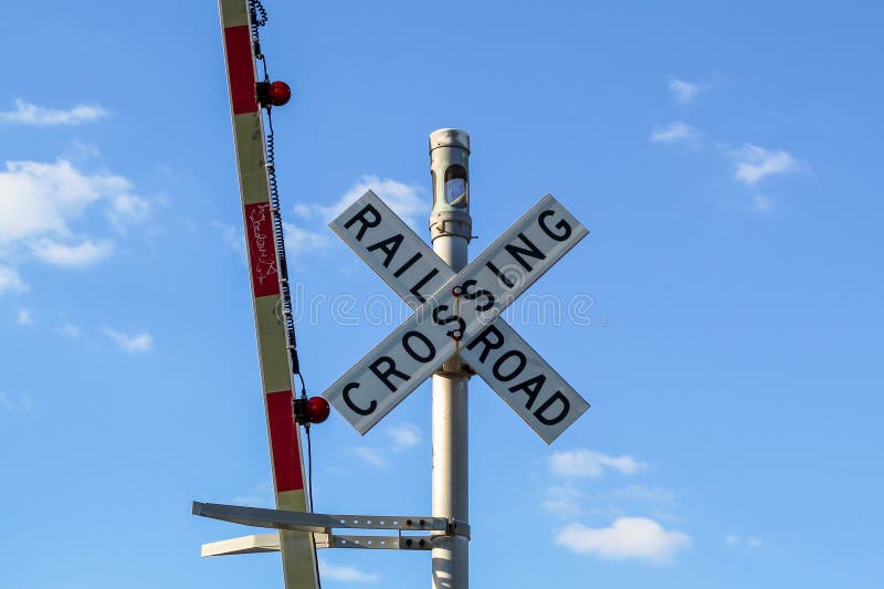 Railway Crossing Sign stock photo. Image of signage - 334753988