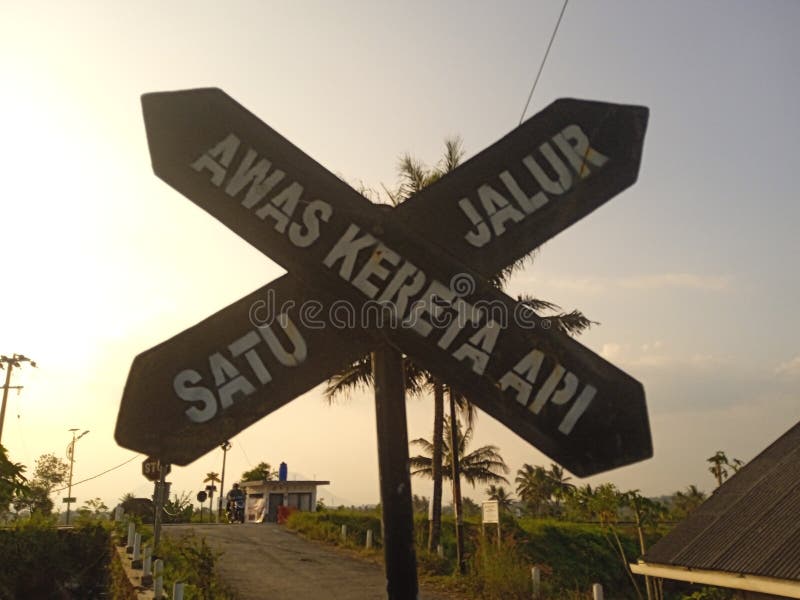 Railway Crossing Warning Sign Stock Photo - Image of signpost, warning ...