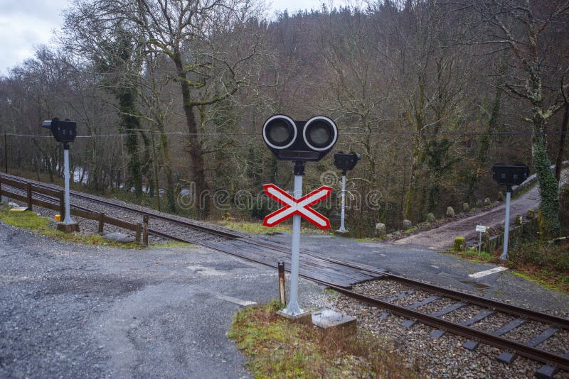 Railway Level Crossing Marked with Traffic Lights and Signs Stock Photo ...