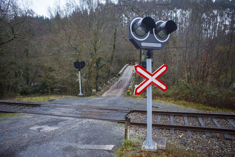 Railway Level Crossing Gate with Red Vintage Warning Lamp. Stock Photo ...