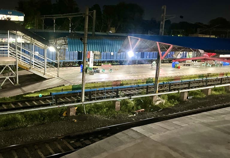Railway Platform at Night Covered in Low Warm Light Editorial Photo ...