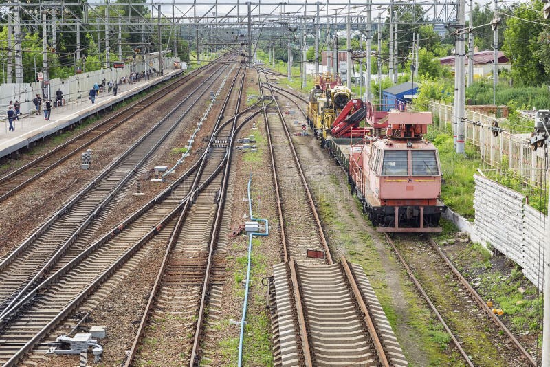Railway Platform with Passengers and Locomotives. View from Above ...