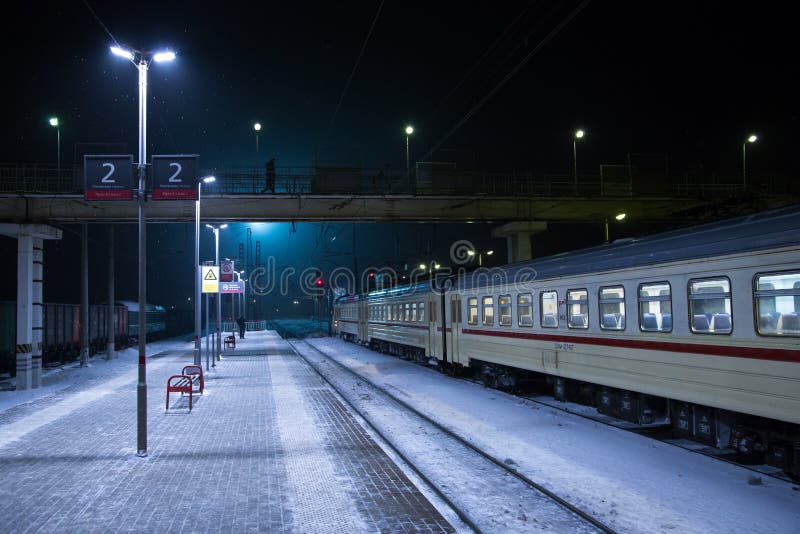 Railway Platform with a Train at Night in the Winter Editorial Stock ...