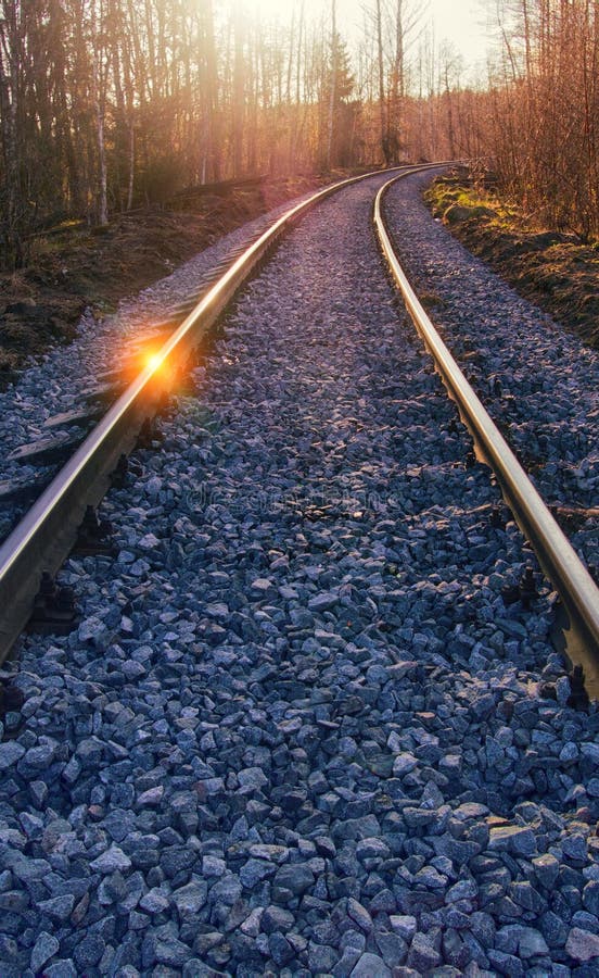 Setting Sun and Reflection on Rails Stock Photo - Image of grit, road ...