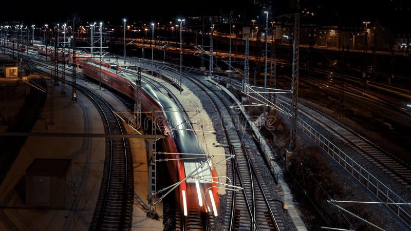 Railway Station with Motion Train at Night Stock Image - Image of ...