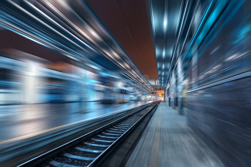 Railway Station at Night with Motion Blur Effect. Railroad Stock Photo ...