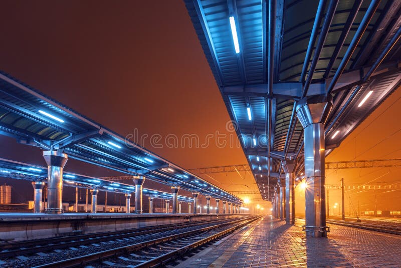 Railway Station at Night. Train Platform in Fog Stock Photo - Image of ...