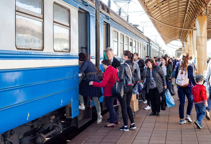 Minsk, Belarus, May 6, 2018: Railway Station Passengers Enter the Train ...