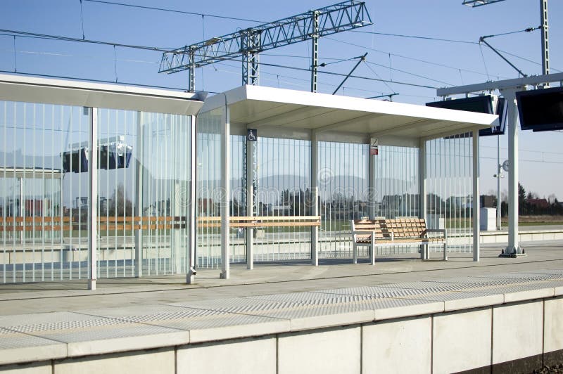 Railway Station Platform with Sign and Tracks Stock Image - Image of ...