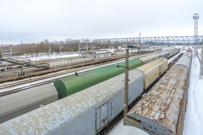 Railway Station in Russia and Freight and Passenger Trains Editorial ...
