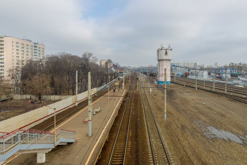 Railway Station in Russia and Freight and Passenger Trains Editorial ...