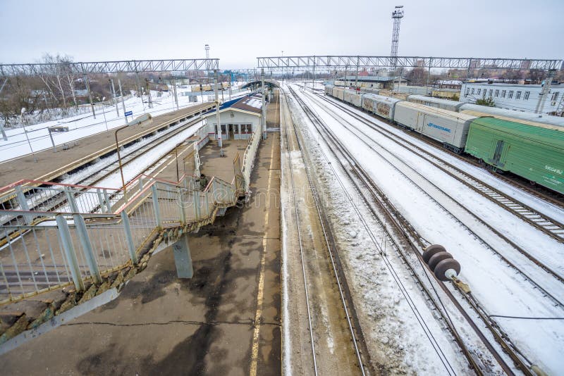 Railway Station in Russia and Freight and Passenger Trains Editorial ...