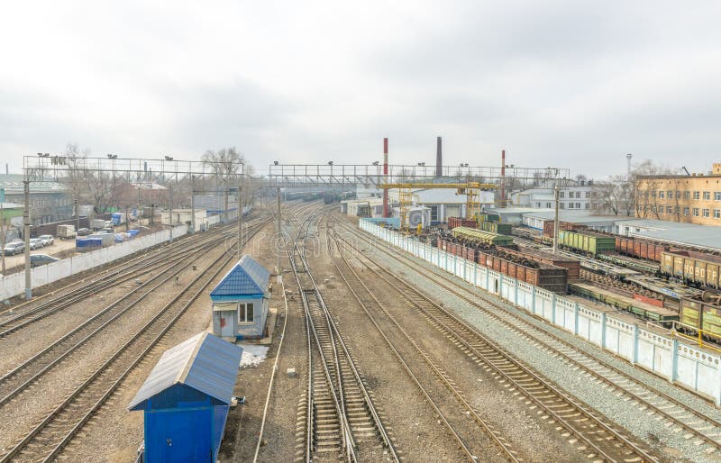 Railway Station in Russia and Freight and Passenger Trains Editorial ...