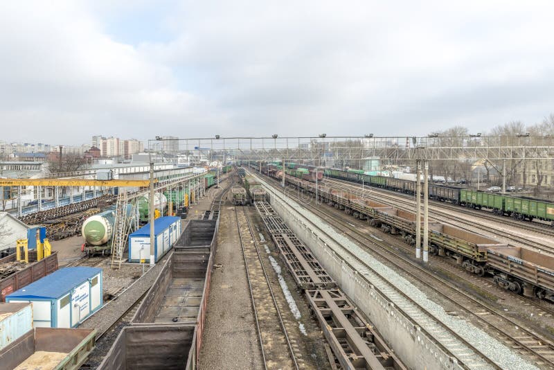 Railway Station in Russia and Freight and Passenger Trains Editorial ...