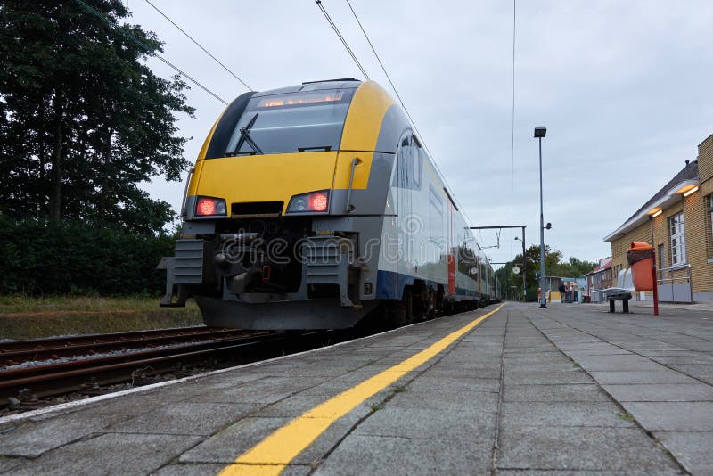 Railway Station with Yellow Train at the Platform Stock Photo - Image ...