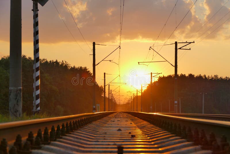 Railway at sunset stock photo. Image of sunshine, rail - 75953162