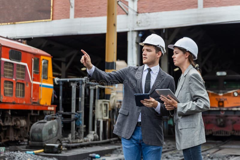 Railway Technician Engineer Wearing Safety Uniform and Safety Helmet ...