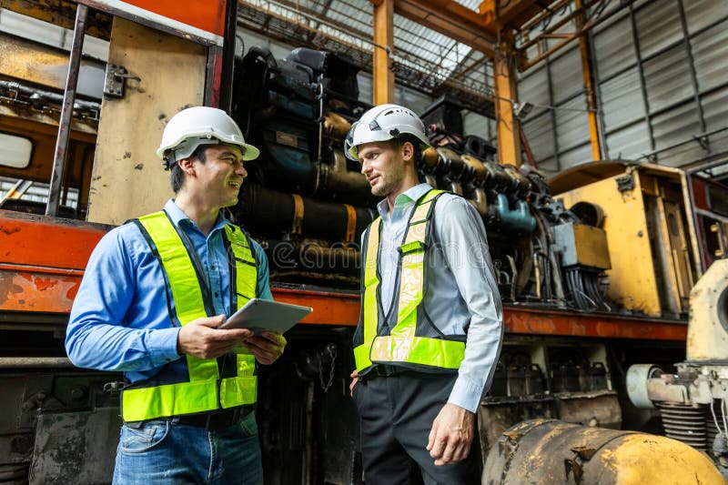 Railway Technician Engineer Wearing Safety Uniform and Safety Helmet ...