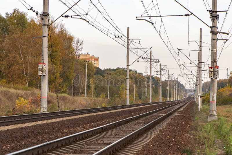 Railway Track with Electricity Pylons in Perspective View Go into the ...