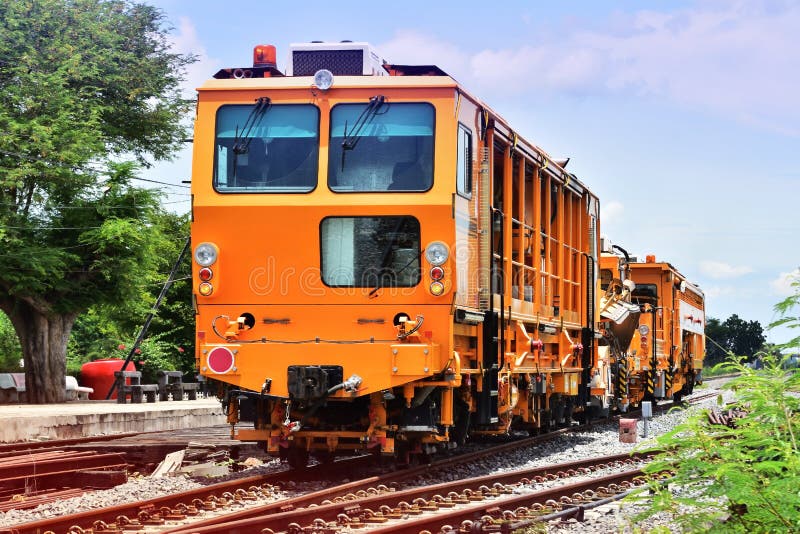 Railway Track Maintenance Machine Stock Photo - Image of vehicle, green ...