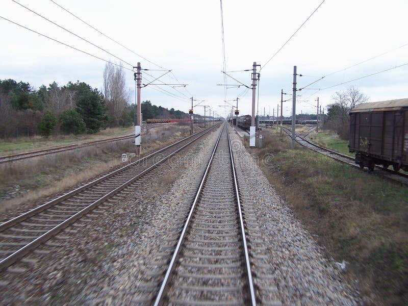 Railway track perspective stock photo. Image of station - 127546636