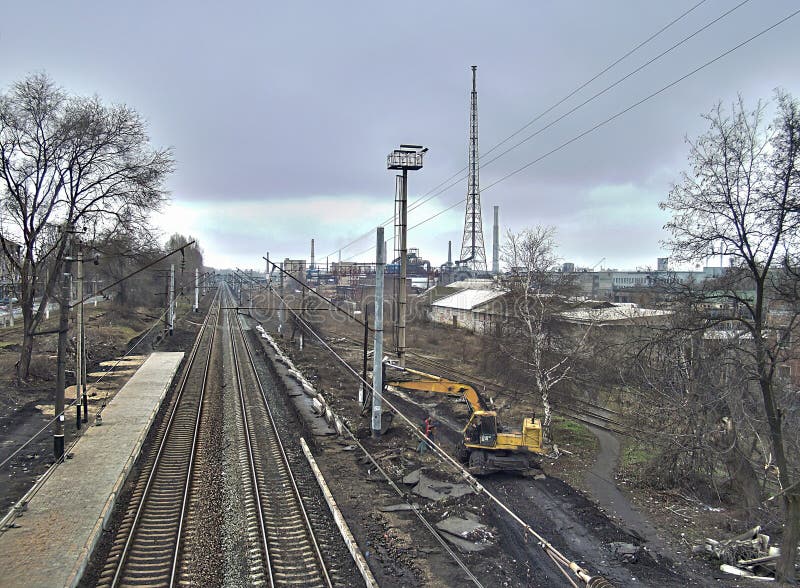 A Railway Track Stretching into the Distance, with Maintenance or ...