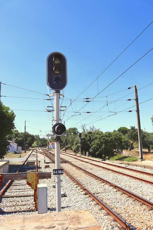 Railway Track, Traffic Lights, and Electric Lines Stock Photo - Image ...
