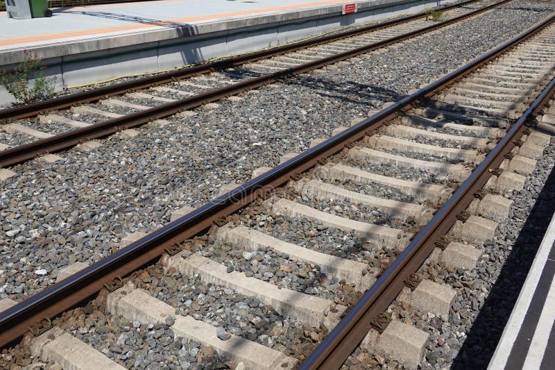Railway Tracks at an Empty Train Station Platform Stock Photo - Image ...