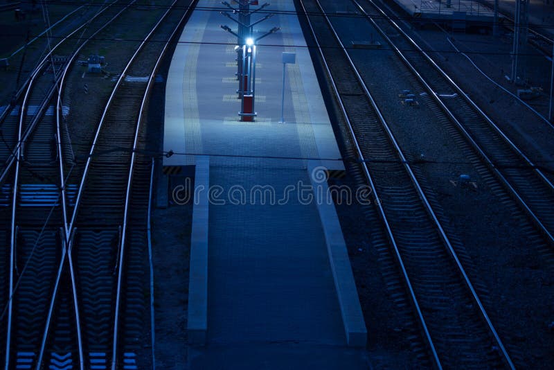 Railway Tracks at a Major Train Station at Night Stock Image - Image of ...