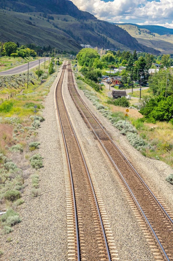 Railway Tracks in Mountain Landscape Stock Image - Image of train, hill ...