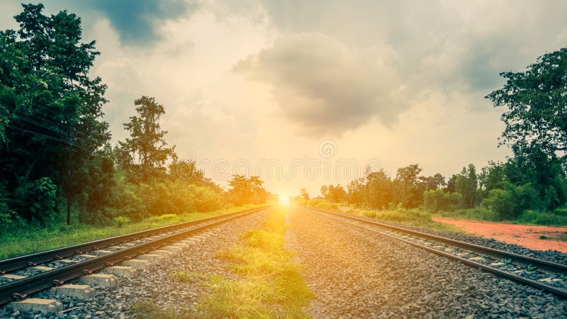 Railway Tracks in a Rural Scene with Sunset Stock Image - Image of land ...