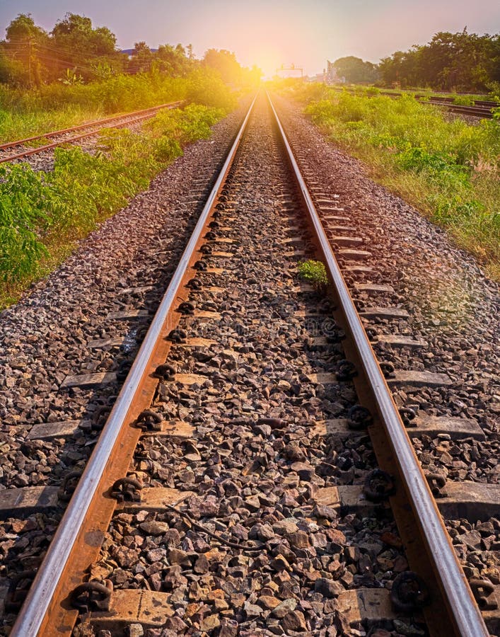 Railway Tracks in Sun Raise Moment with Flair of Sun Stock Photo ...