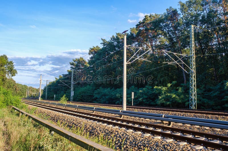 Railway Tracks View. Railway Rails and Embankment Surrounded by Forest ...