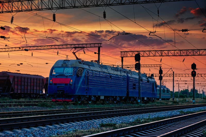 Railway and Rail Cars in a Beautiful Sunset, Dramatic Sky and Sunlight ...