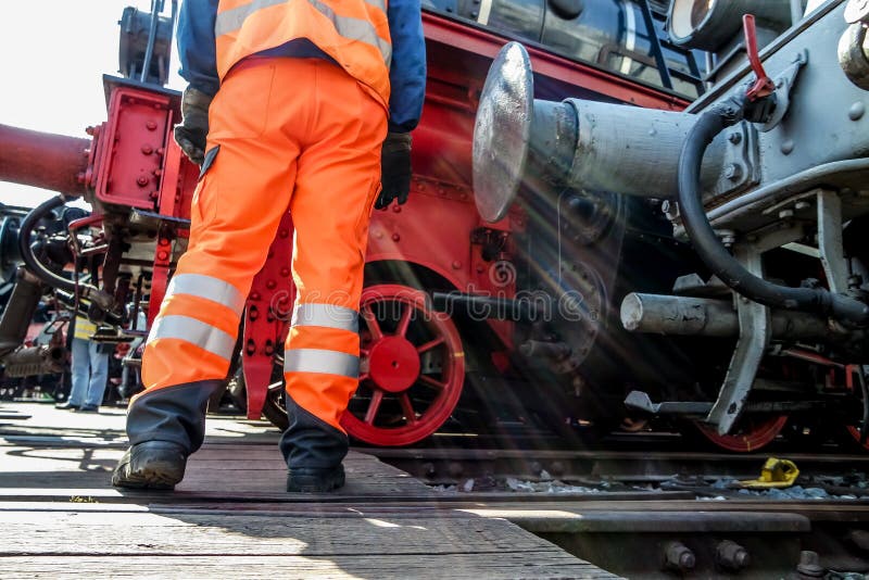 Railway worker in action stock photo. Image of placement - 57871972