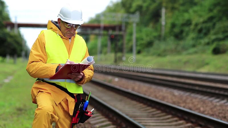 Inspector of Railway Traffic Makes Notes in His Documents Stock Video ...