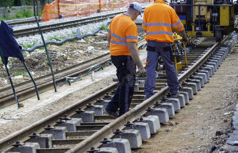 Railway Workers Bolting Track Rail. Stock Photo - Image of ...