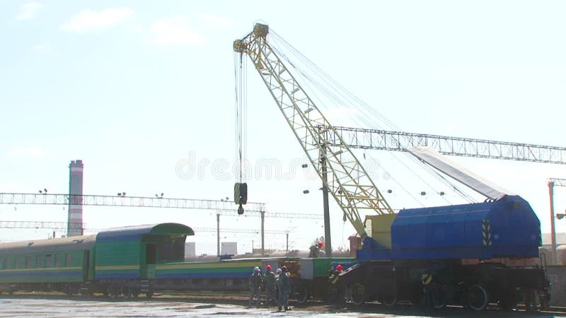 Railway Workmen Loading Wagon with Big Crane at Stock Video - Video of ...