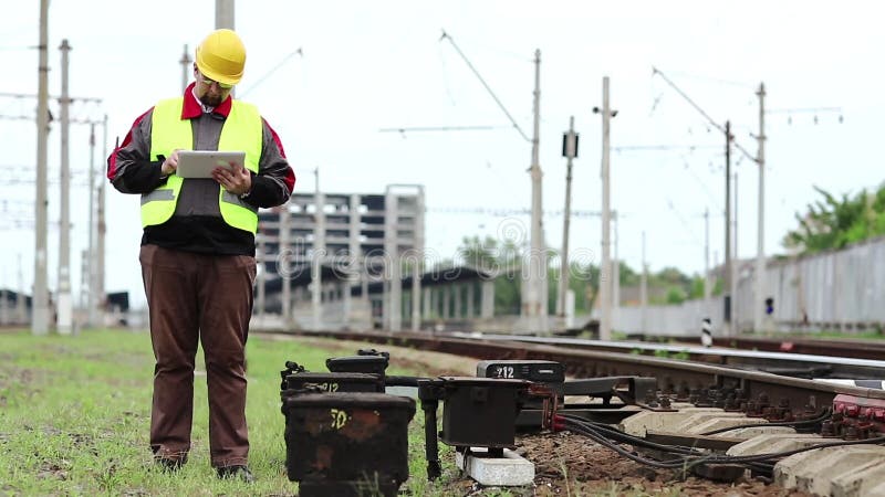 Railwayman Makes Notes in Tablet Computer Stock Footage - Video of ...